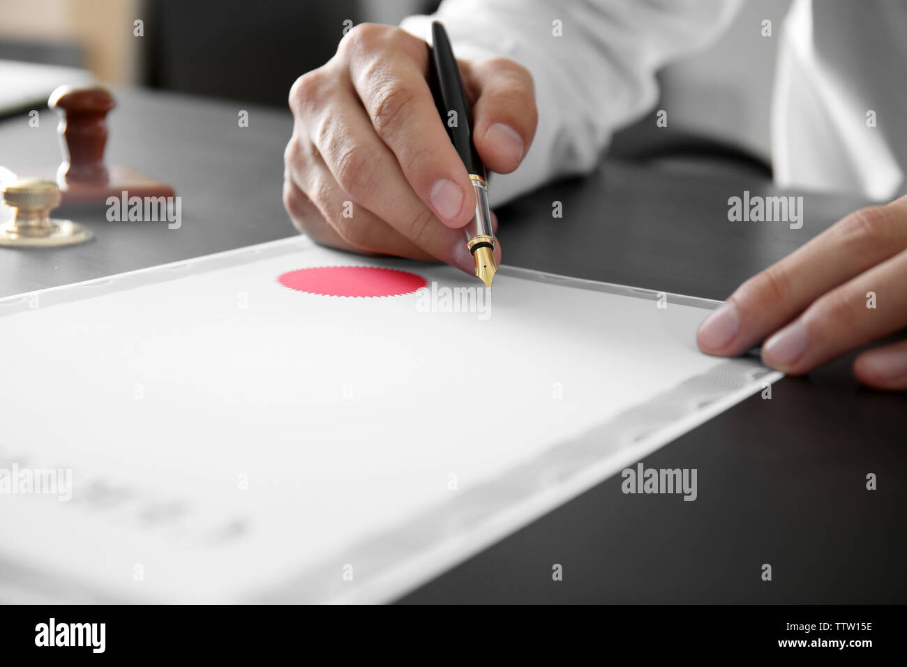 Signing certificate hi-res stock photography and images - Alamy