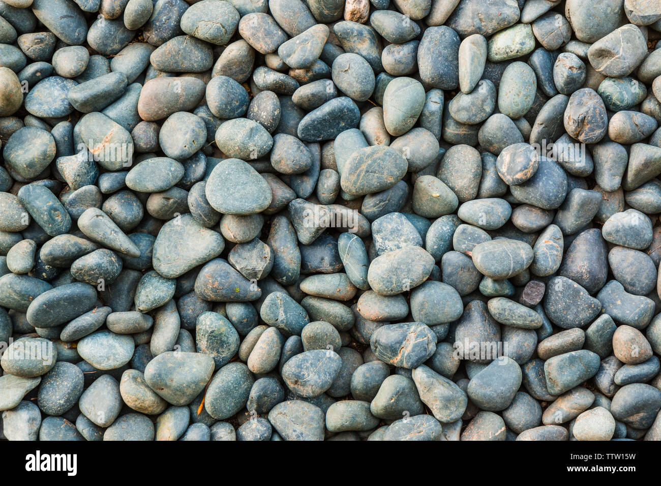Sea stones texture background Stock Photo - Alamy