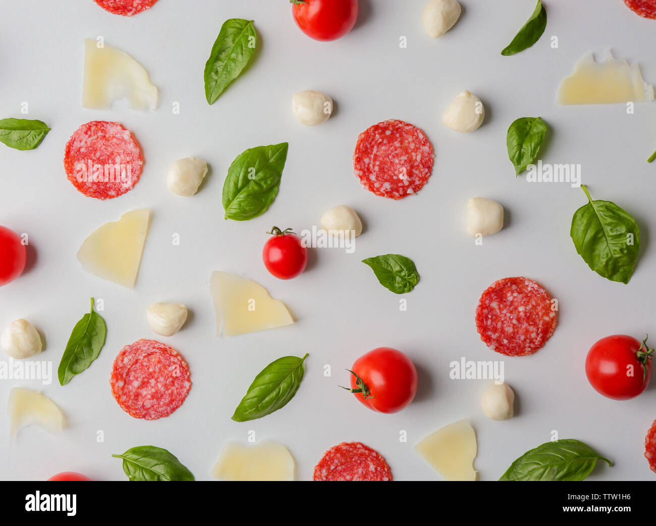 Pizza ingredients on white background Stock Photo - Alamy