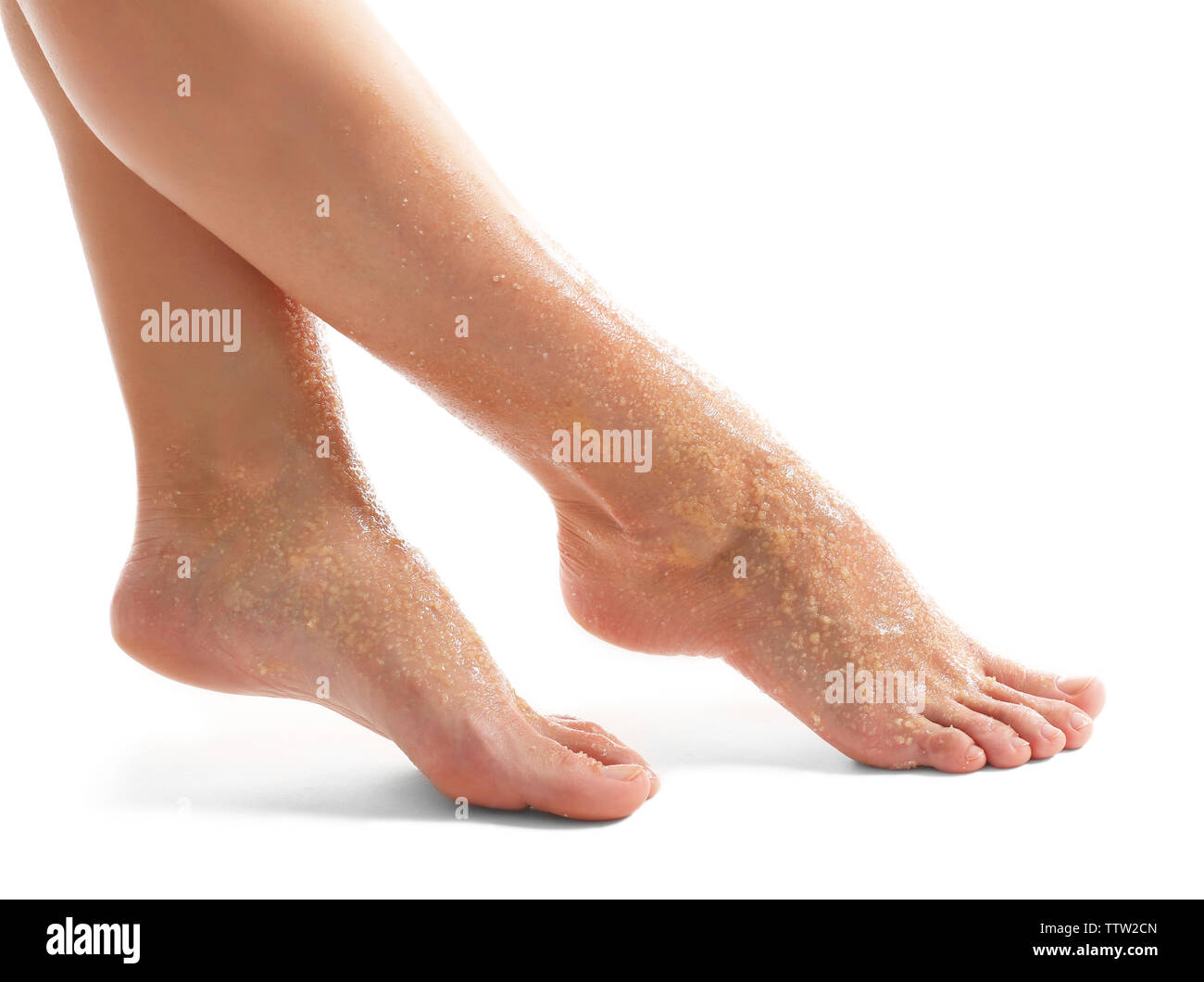 Female feet with scrub isolated on white Stock Photo - Alamy