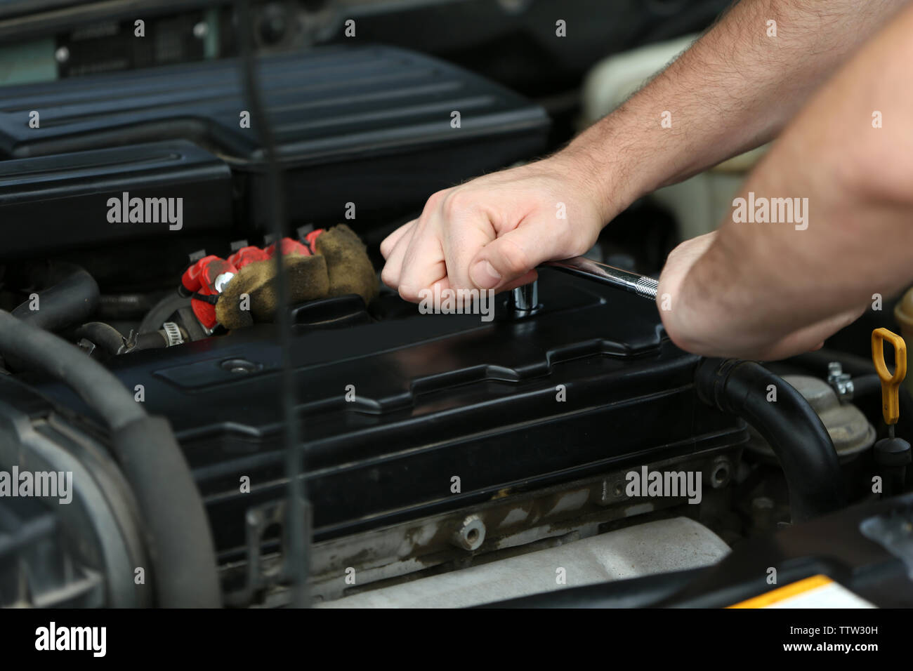 Open car bonnet hands hi-res stock photography and images - Alamy