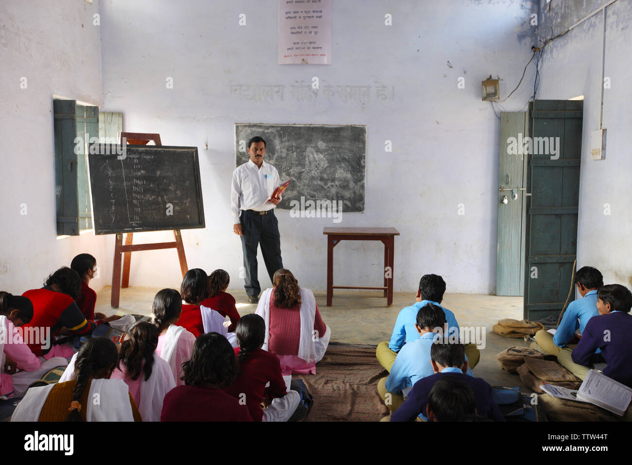 Indian rural teacher man teaching hi-res stock photography and images ...