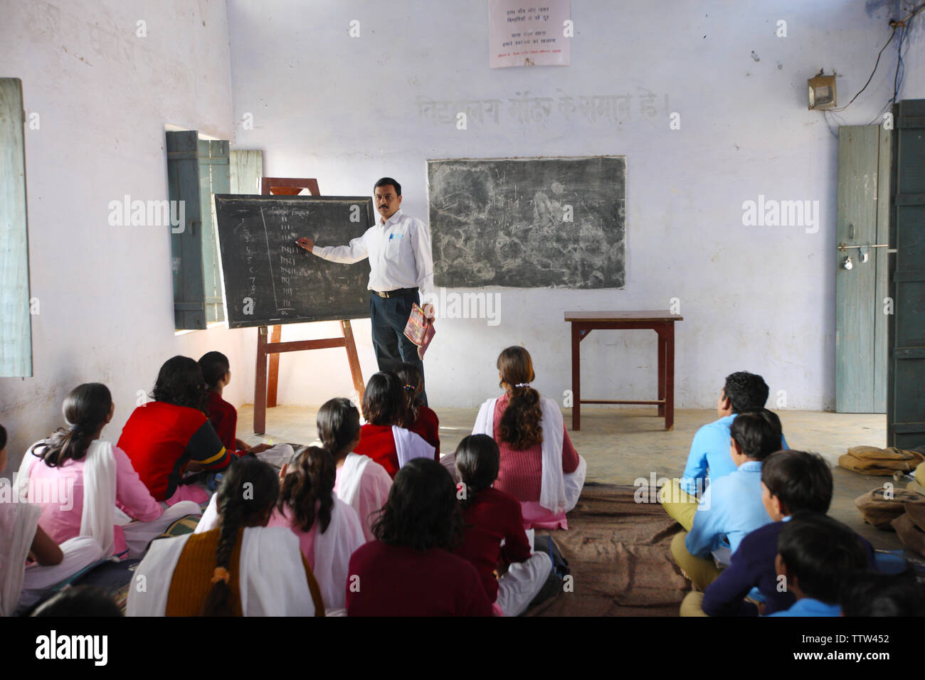 Indian rural teacher man teaching hi-res stock photography and images ...