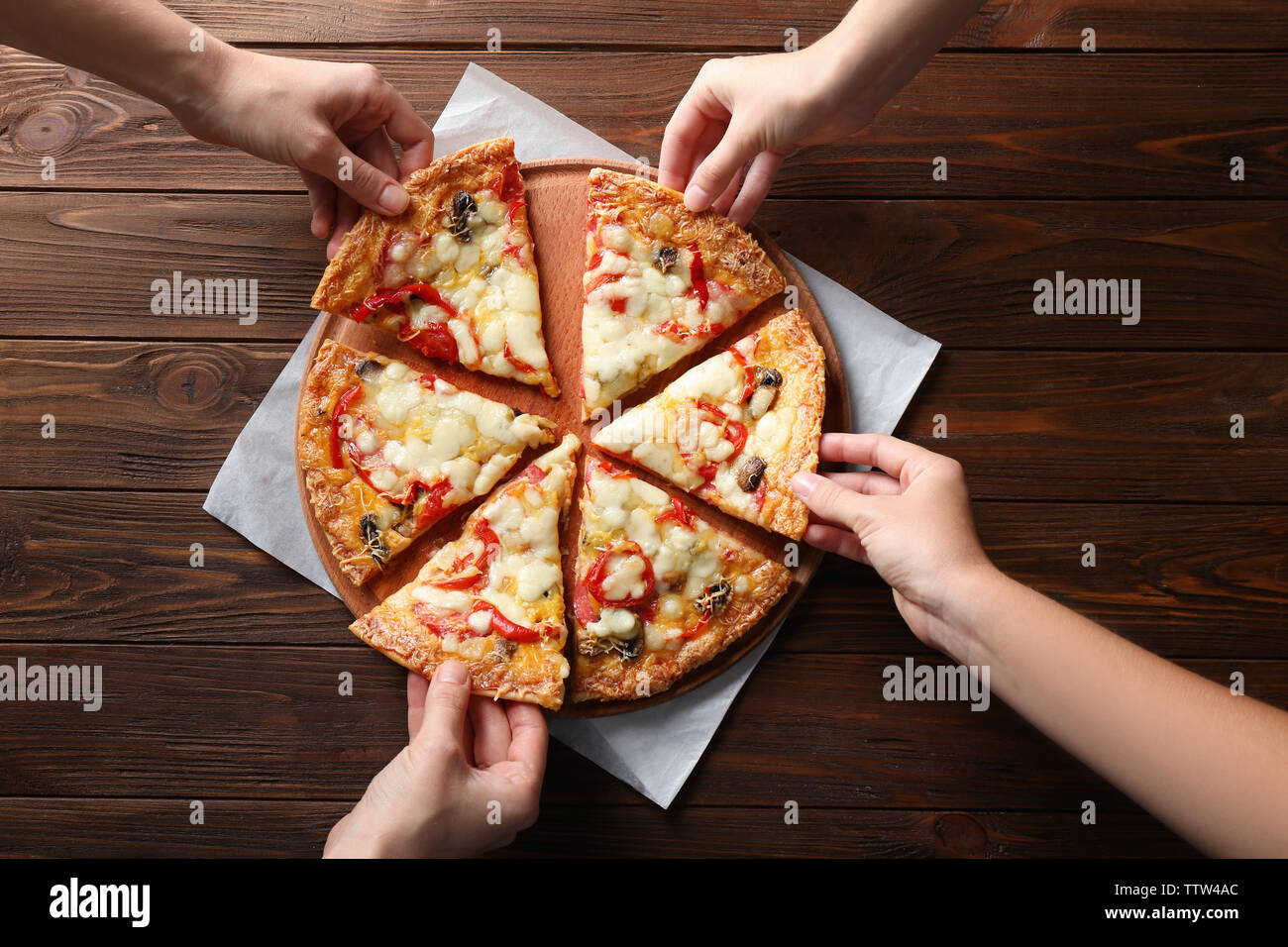 Taking pizza slices hi-res stock photography and images - Alamy