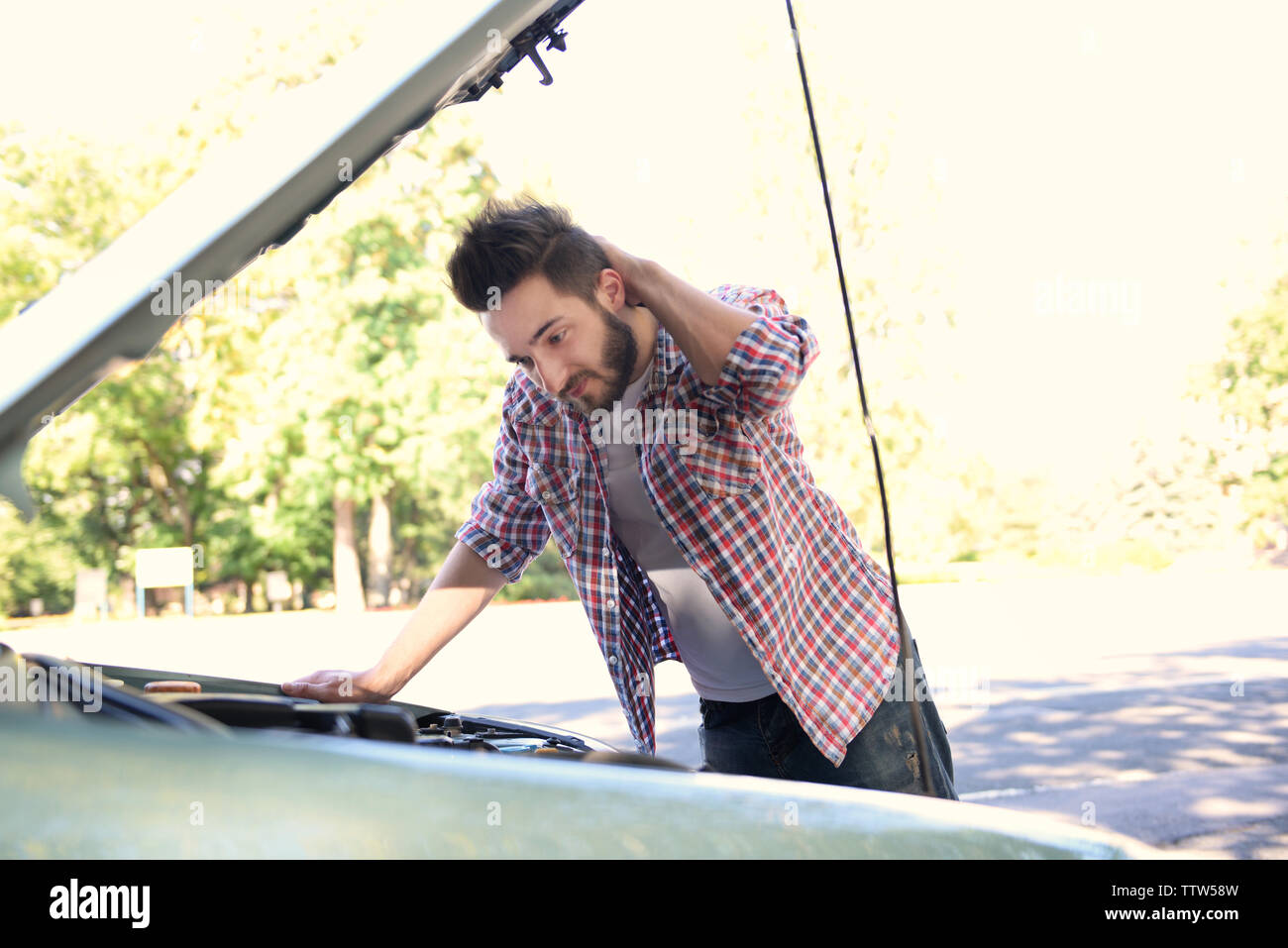 Looking under car hi-res stock photography and images - Alamy