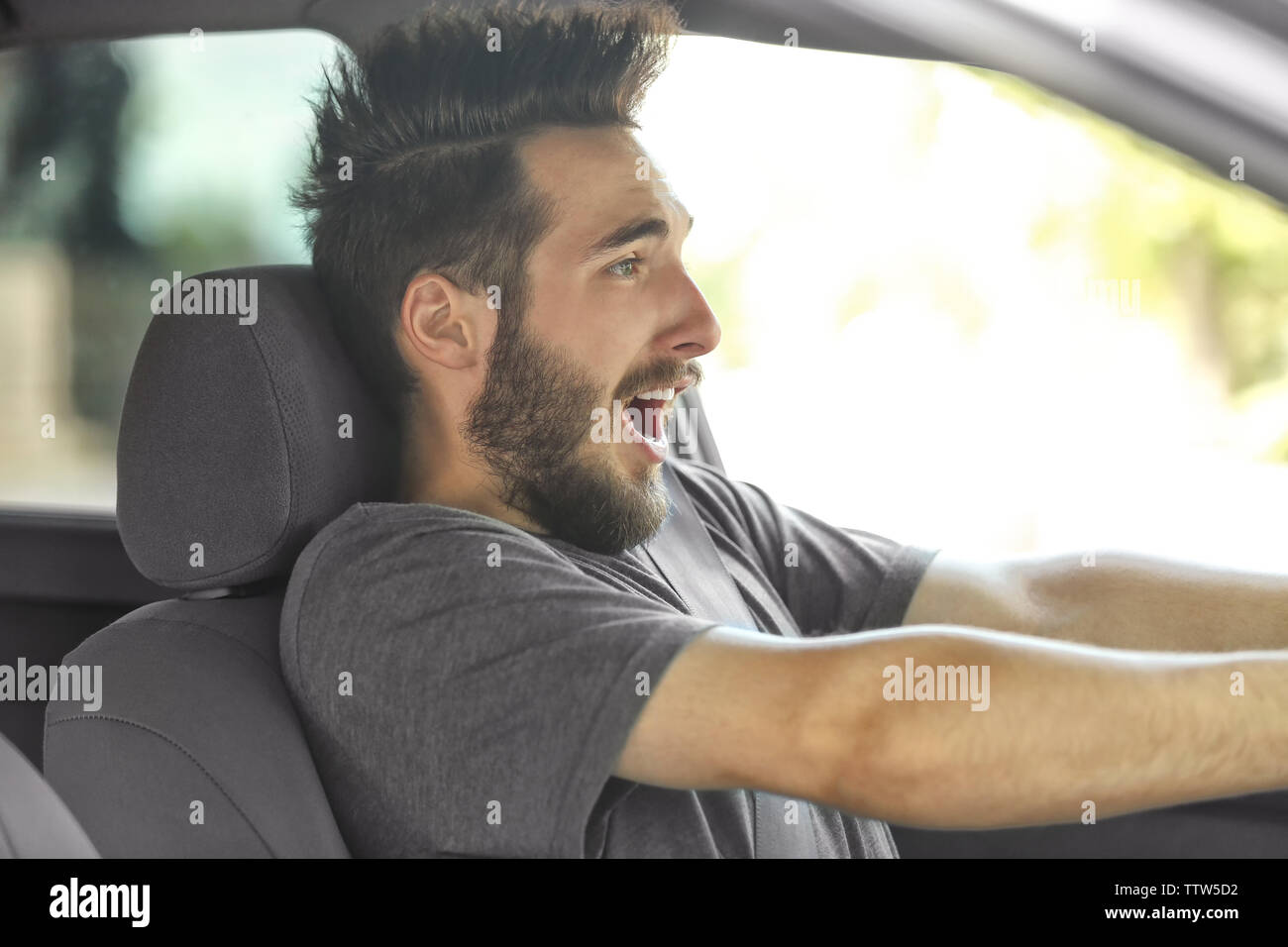 Man driving fast car excited hi-res stock photography and images - Alamy