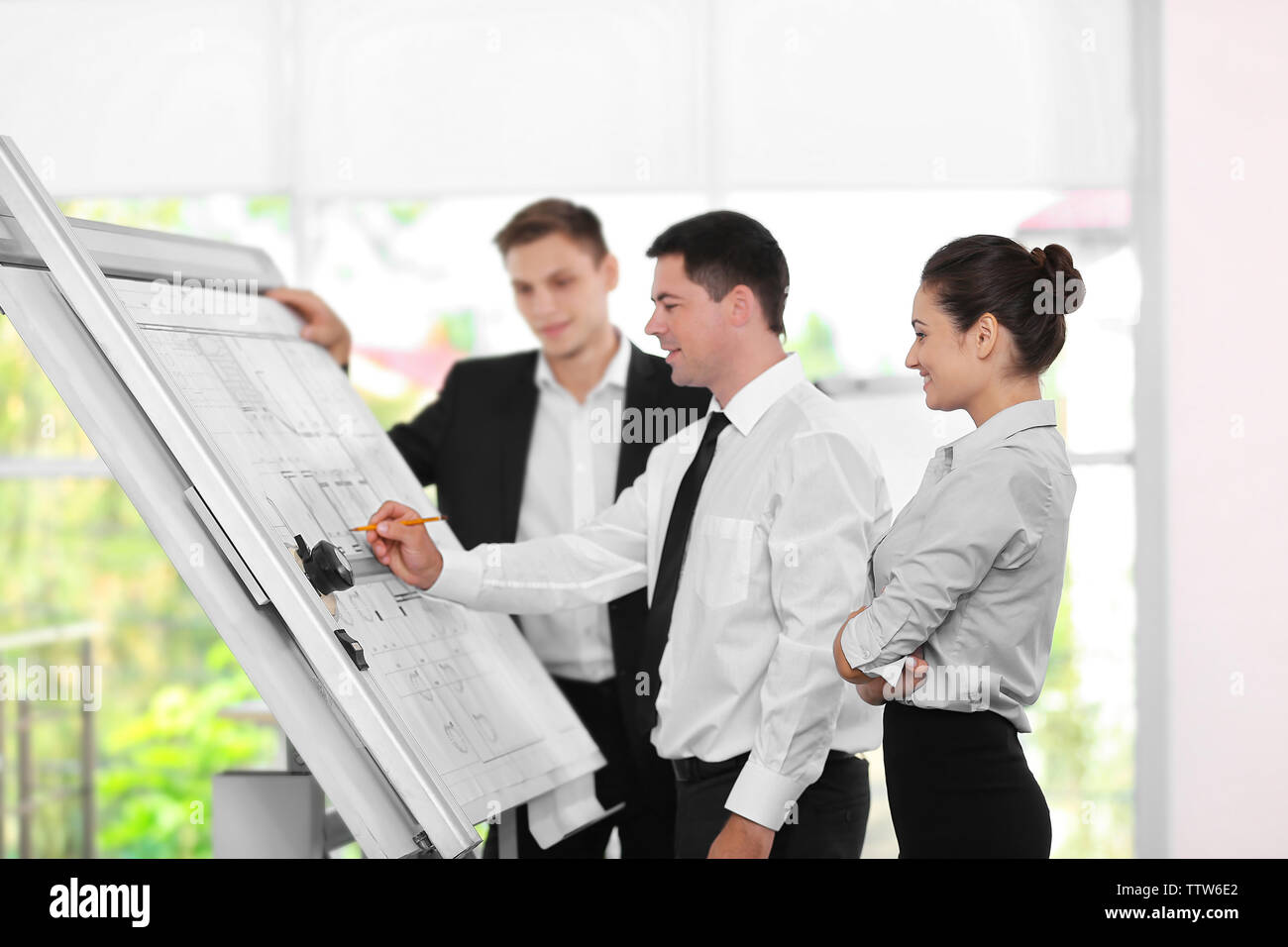Engineers working at drawing board hi-res stock photography and images ...