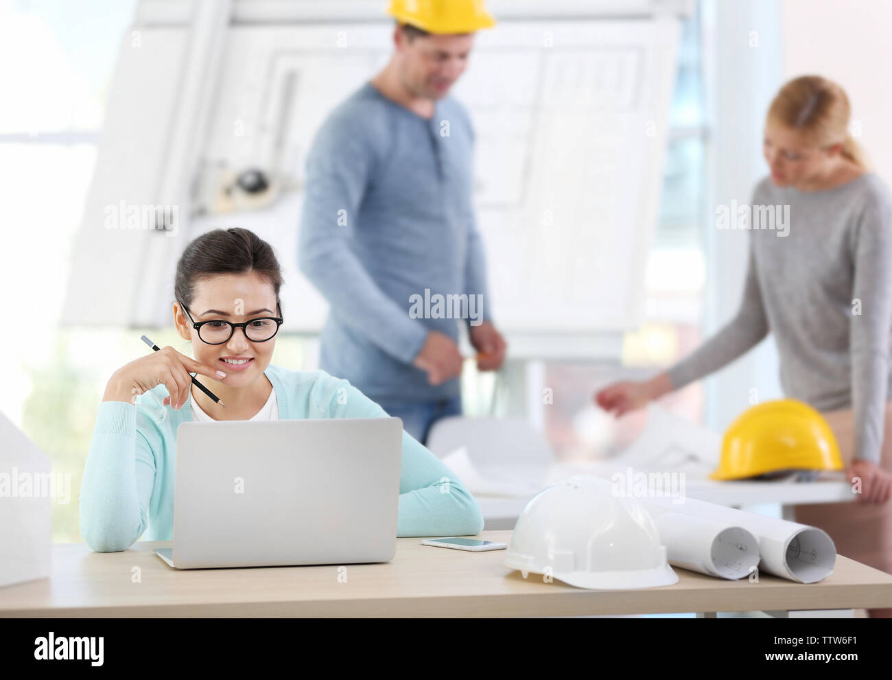 Creative engineers planning new project in office Stock Photo - Alamy