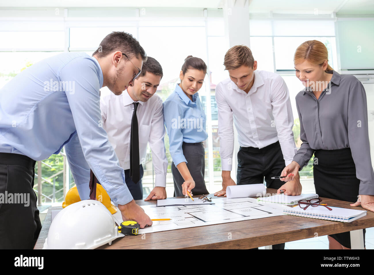 Engineers working in office together hi-res stock photography and ...
