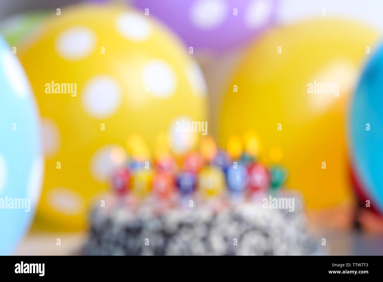 Blurred Birthday cake on balloons background Stock Photo - Alamy