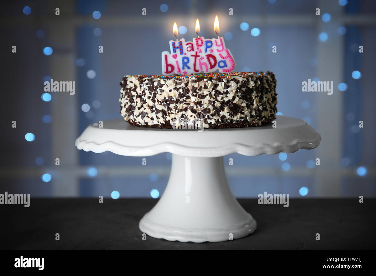 Birthday cake on lights background Stock Photo - Alamy