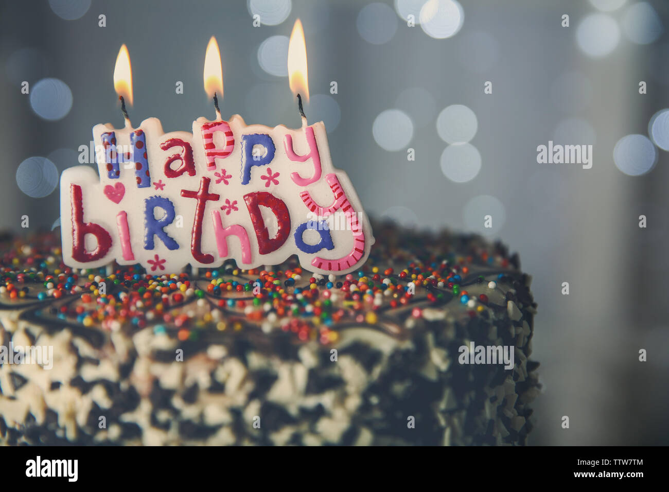 Birthday cake on lights background Stock Photo - Alamy