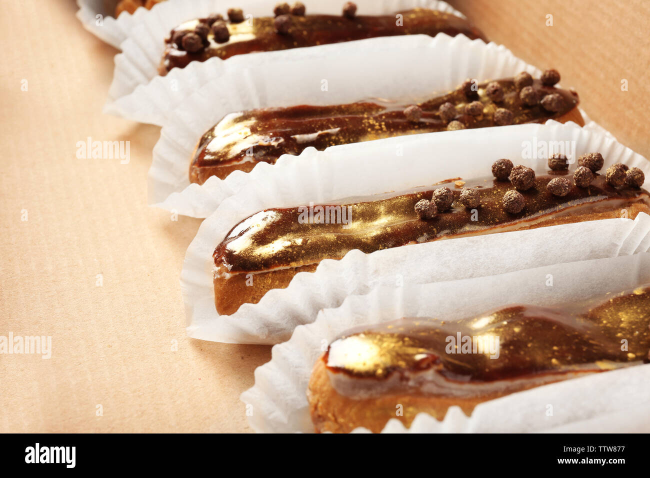 Delicious eclairs in cardboard box closeup Stock Photo - Alamy