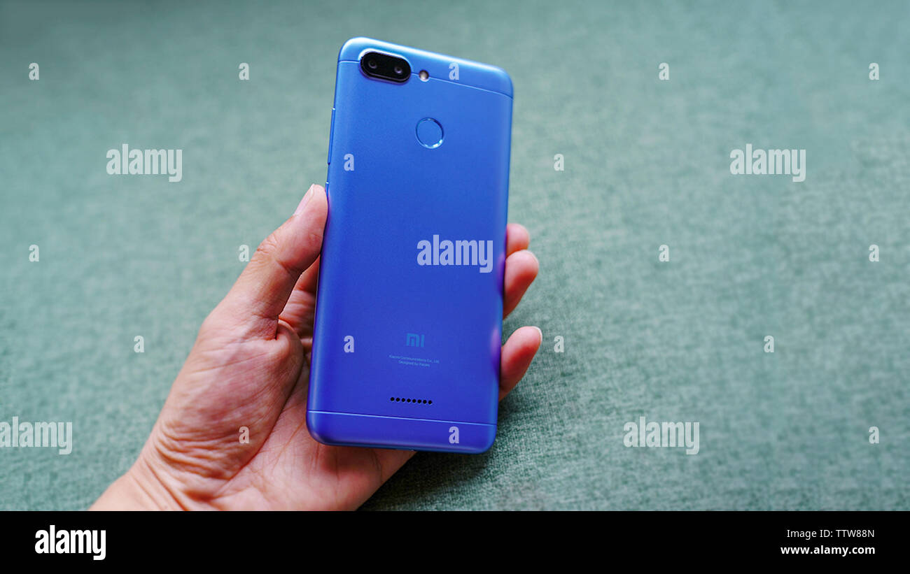 Red rice 6 red rice mobile phone 6 Stock Photo - Alamy