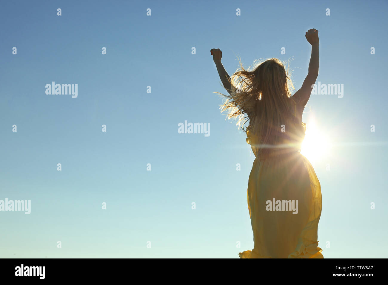 Female sky blue dress silhouette hi-res stock photography and images ...