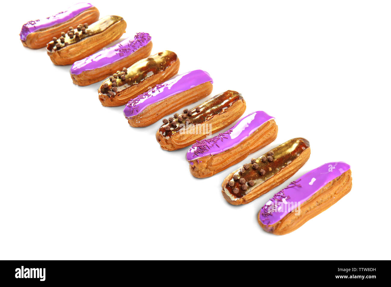 Delicious eclairs isolated on white Stock Photo - Alamy