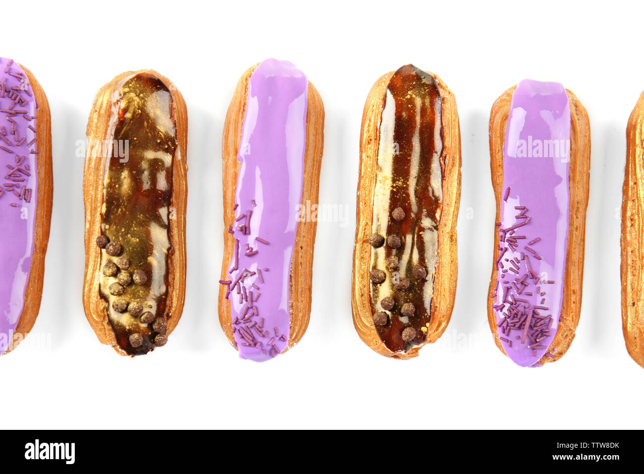 Delicious eclairs isolated on white Stock Photo - Alamy