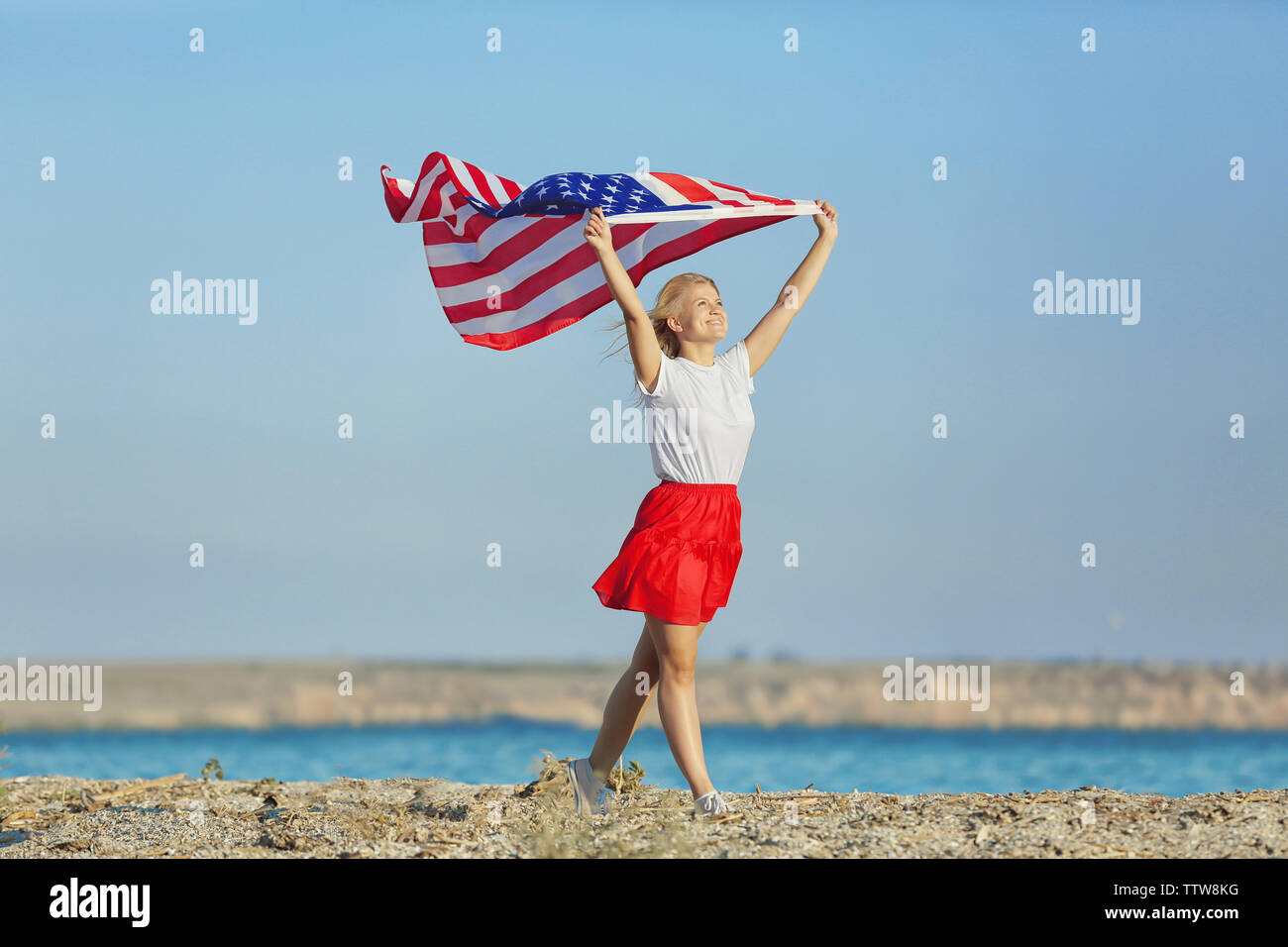 Youth raising flag hi-res stock photography and images - Alamy