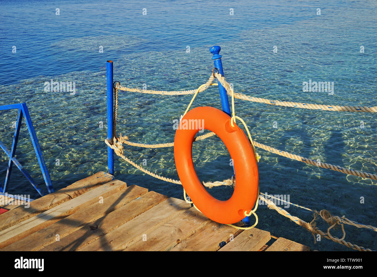 Lifebuoy on the sea pier Stock Photo - Alamy