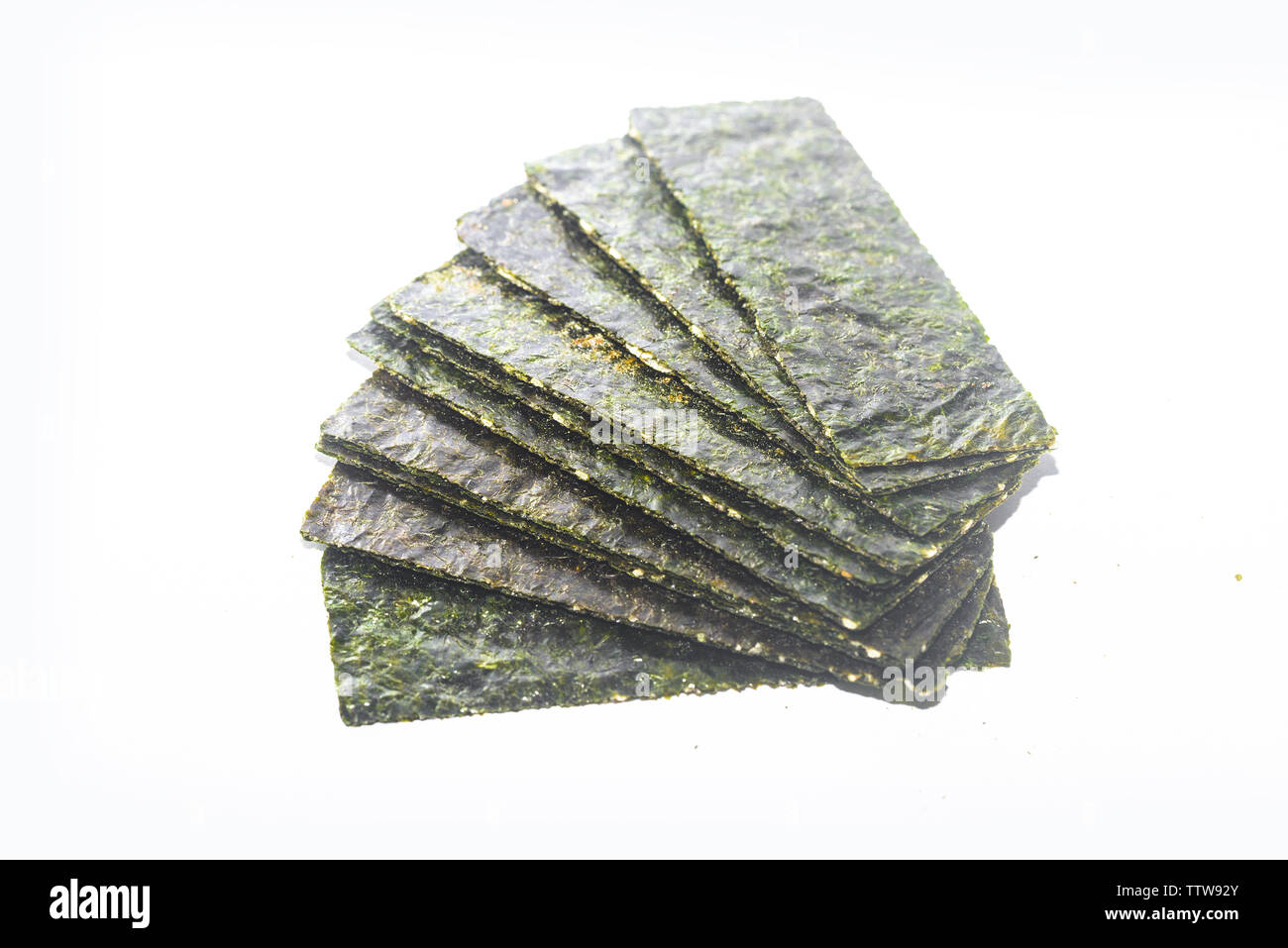 Seaweed on white background Stock Photo - Alamy