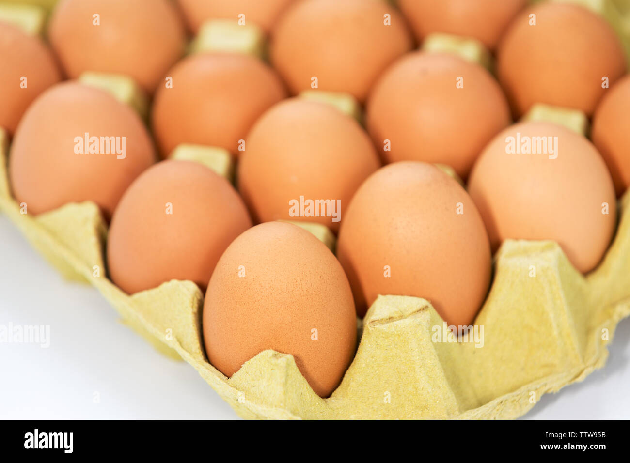 Eggs on white background Stock Photo - Alamy