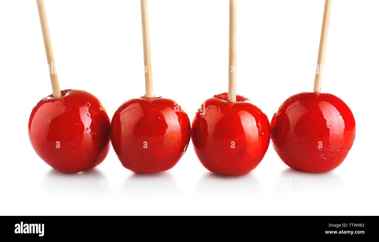 Toffee apples on white background Stock Photo - Alamy