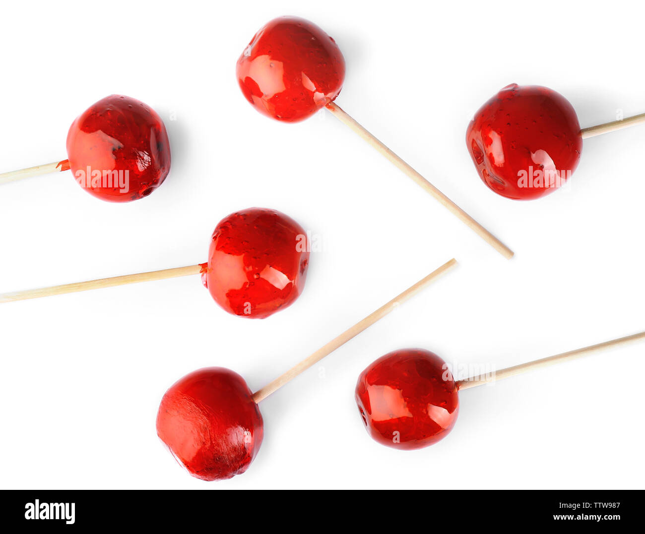 Toffee apples on white background Stock Photo - Alamy