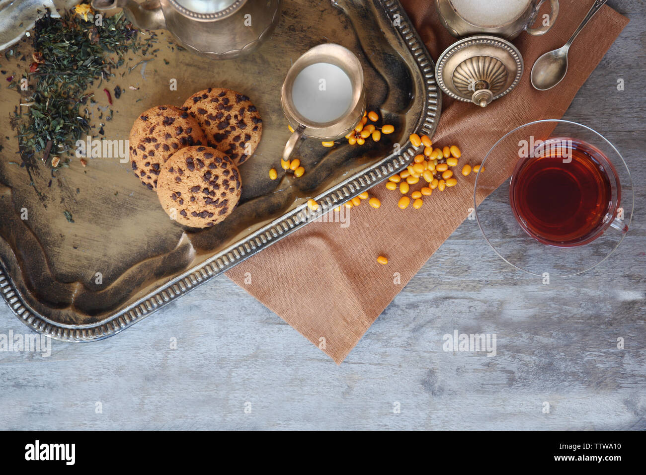 Tasty tea composition on metal tray, top view Stock Photo - Alamy