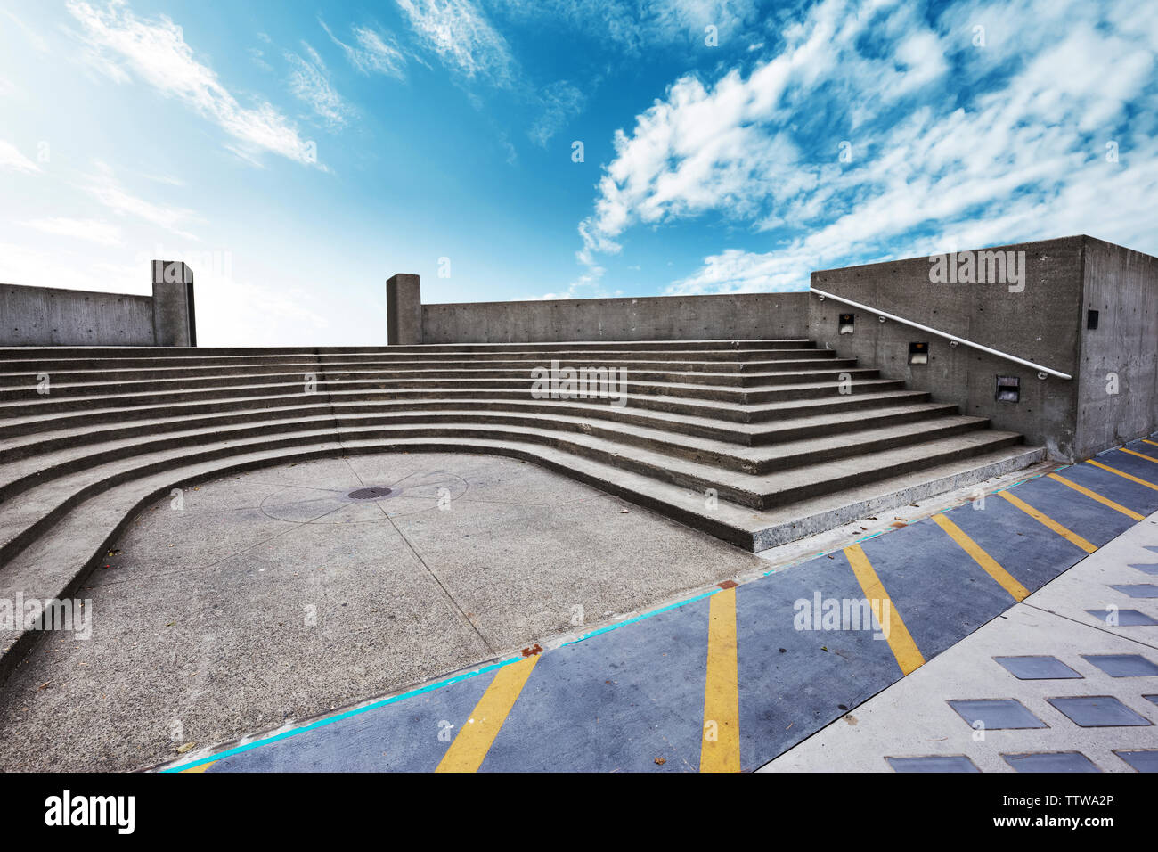 skyscape on view of empty ground with steps Stock Photo - Alamy