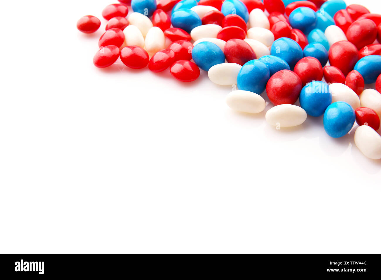 Sweet drops isolated on white Stock Photo - Alamy