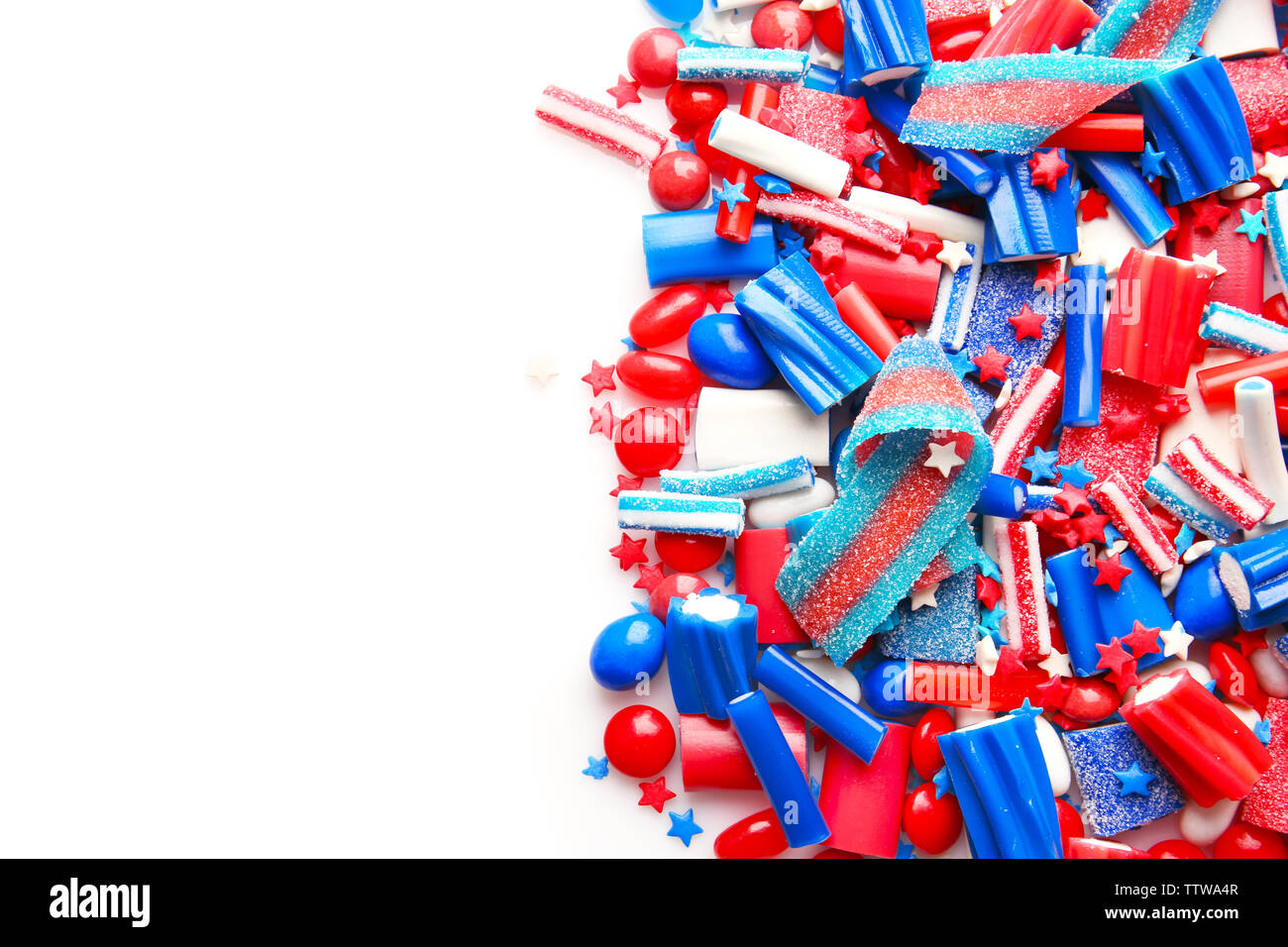 Assorted sweet candies on white background Stock Photo - Alamy