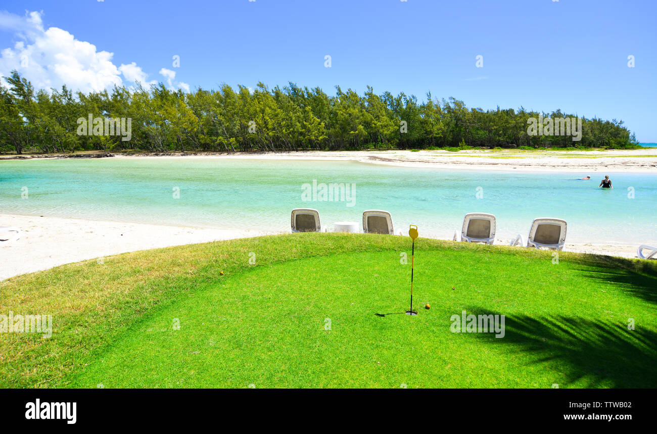 Beautiful landscape of a golf court on ocean background Stock Photo - Alamy