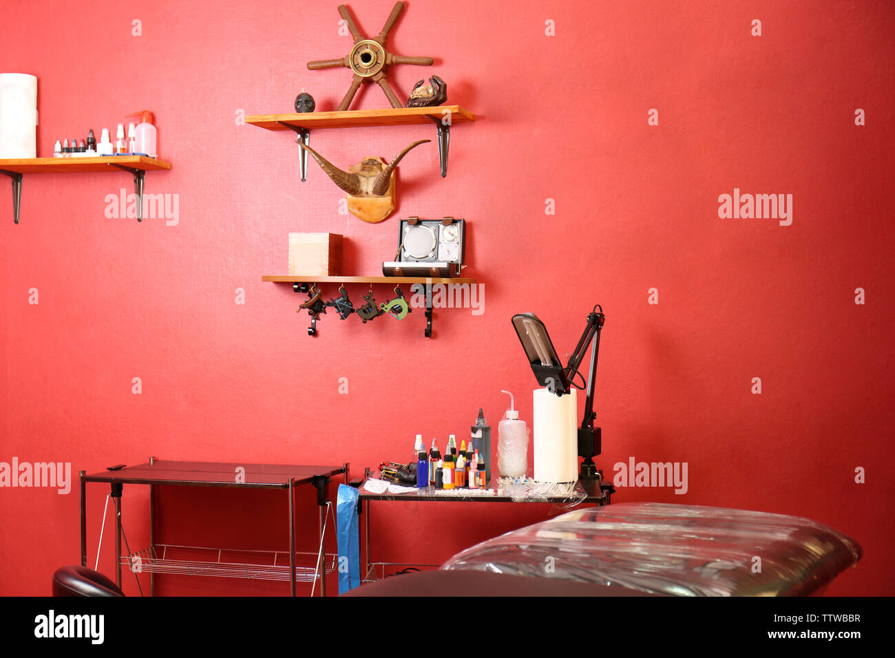 Creative interior of tattoo master studio Stock Photo - Alamy