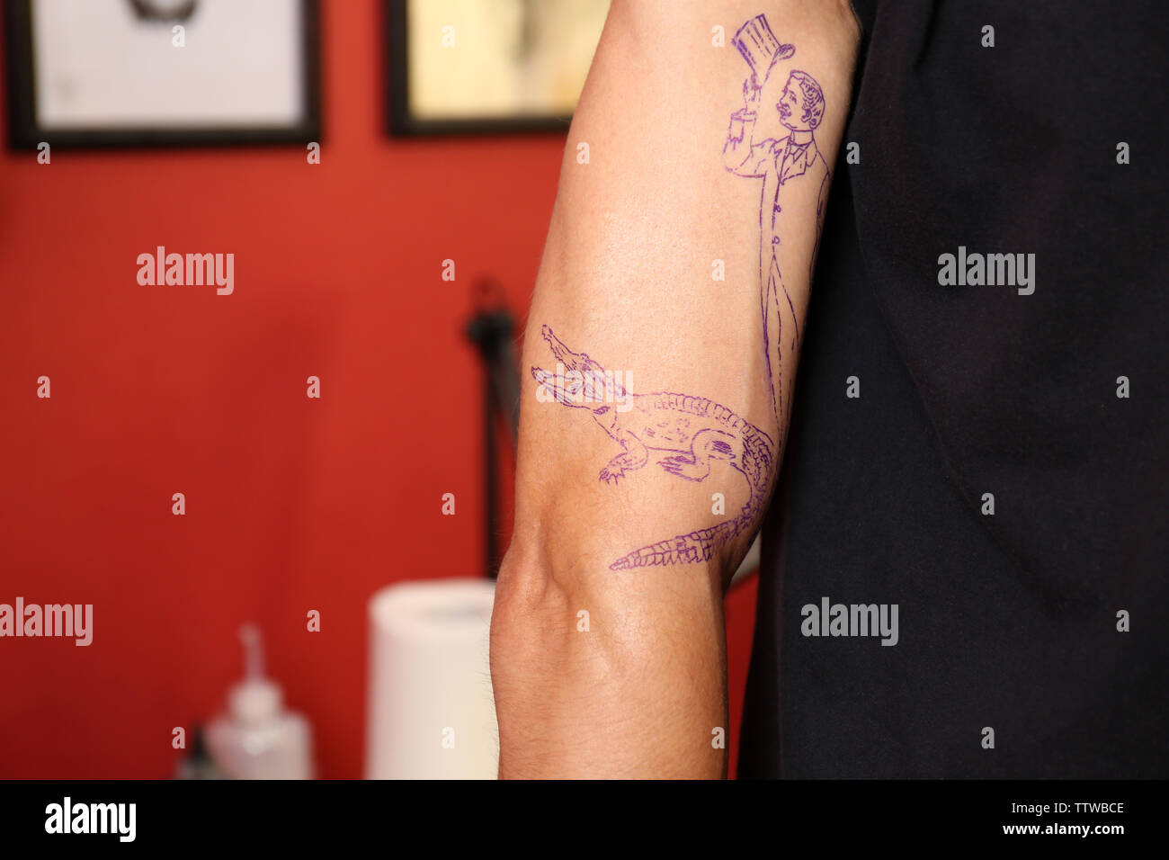 Male arm with applied tattoo sketch, close up view Stock Photo - Alamy