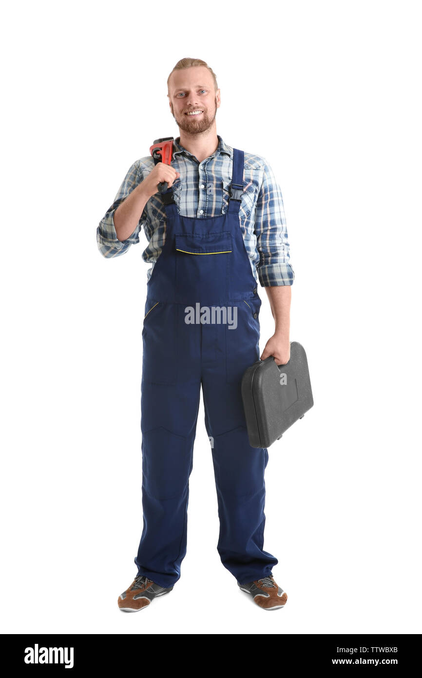 Handsome plumber with pipe wrench and tool box isolated on white Stock ...