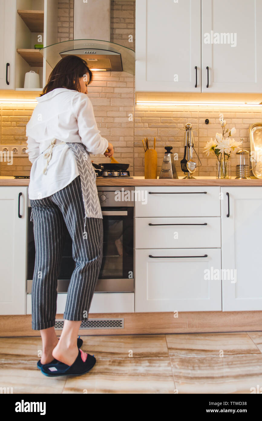 Woman oven rear hi-res stock photography and images - Alamy