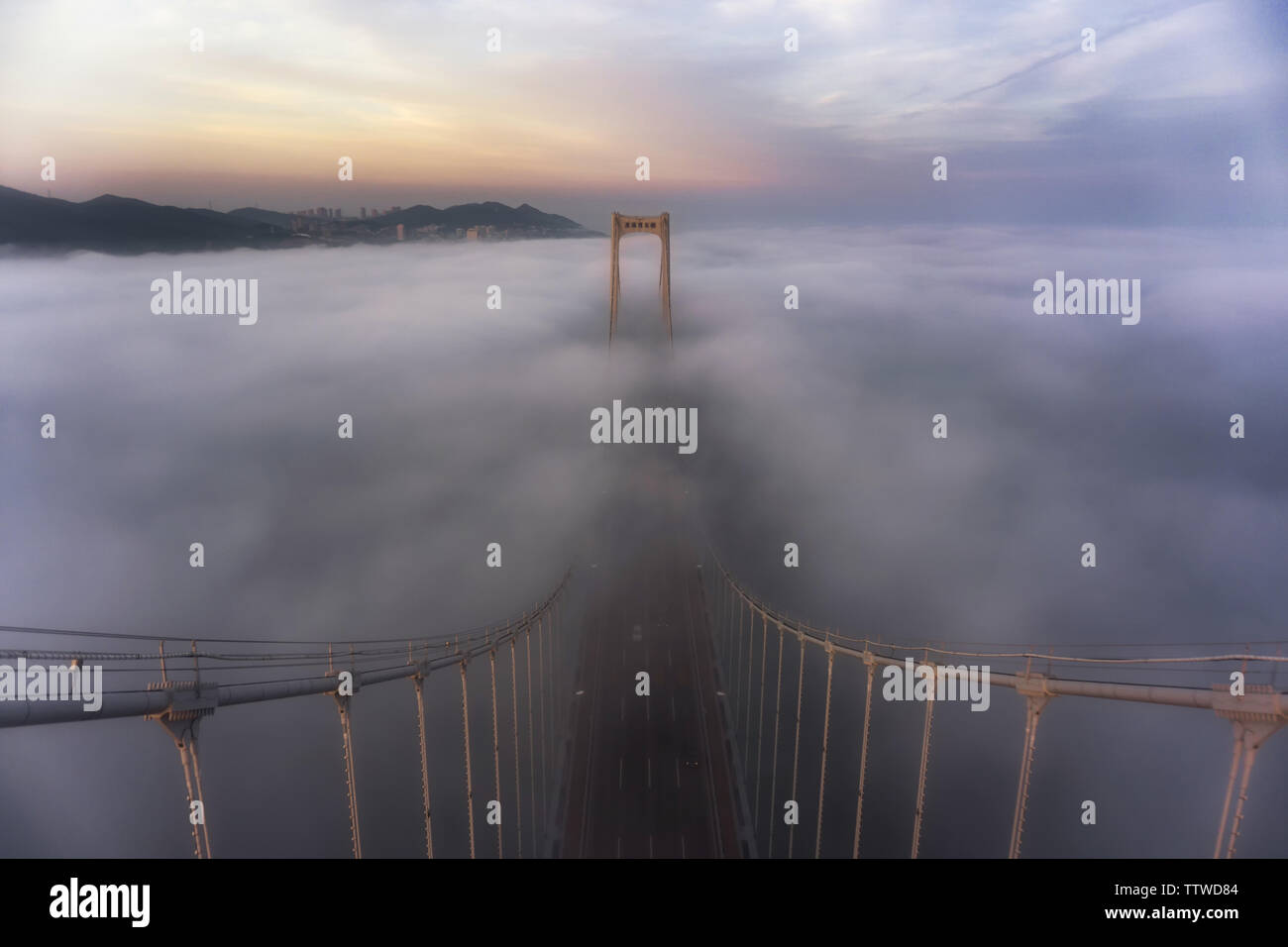 Flow fog of Dalian Xingwan Bridge Stock Photo - Alamy