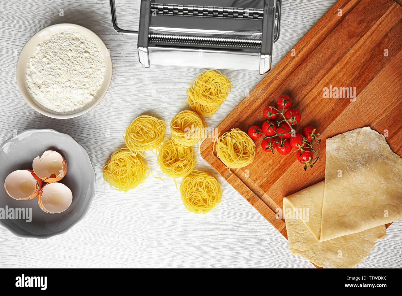Making pasta at home. Composition on kitchen table Stock Photo - Alamy