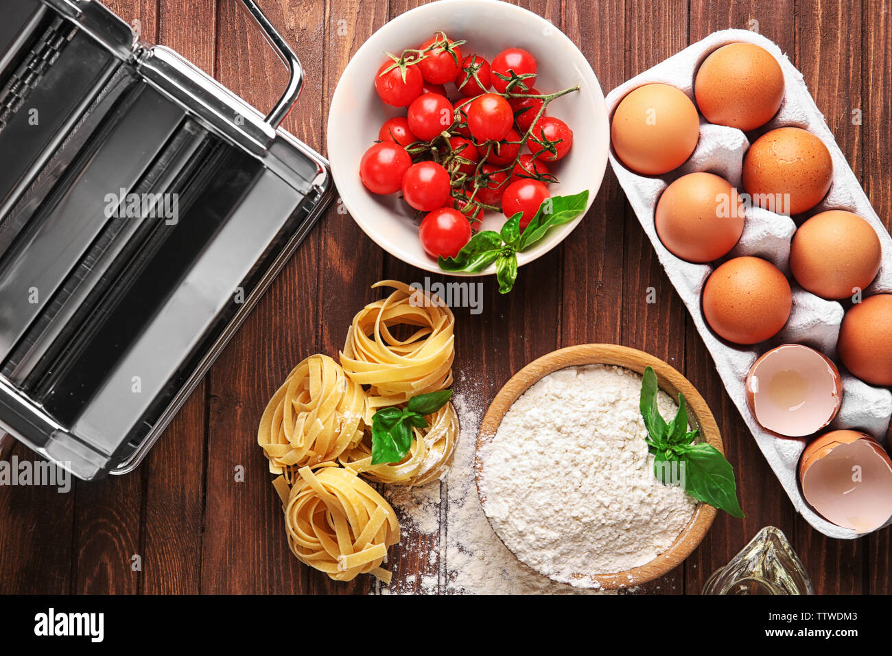 Making pasta at home. Composition on kitchen table Stock Photo - Alamy
