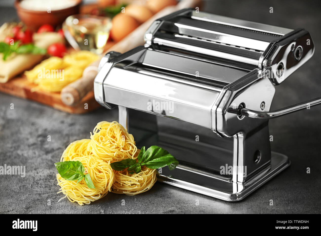 Making pasta at home. Composition on kitchen table Stock Photo - Alamy