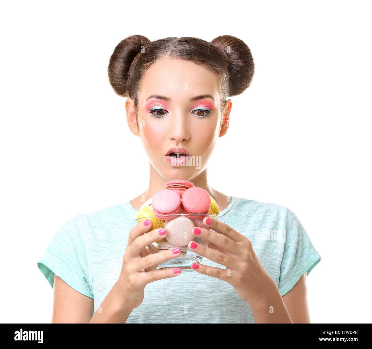 Cute girl with macaroons on white background Stock Photo - Alamy