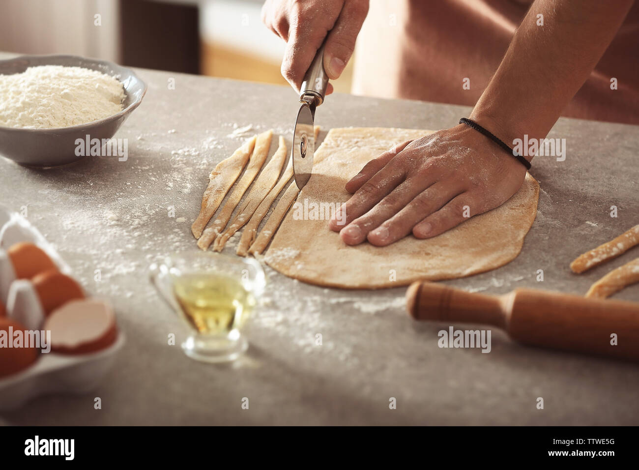 Male hands preparing pasta hi-res stock photography and images - Alamy