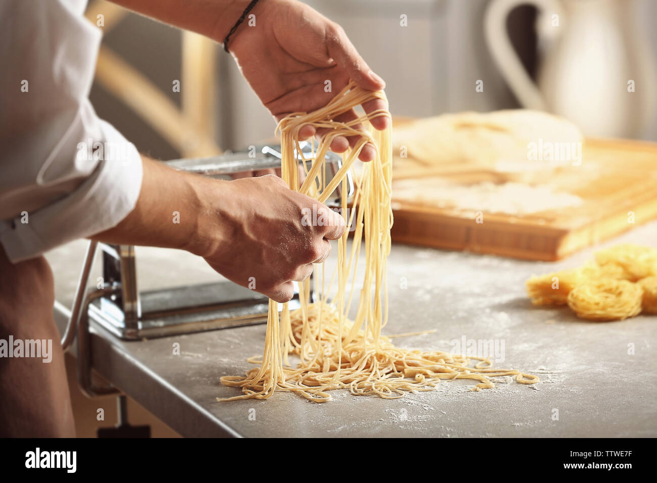Close up man eating pasta hi-res stock photography and images - Alamy