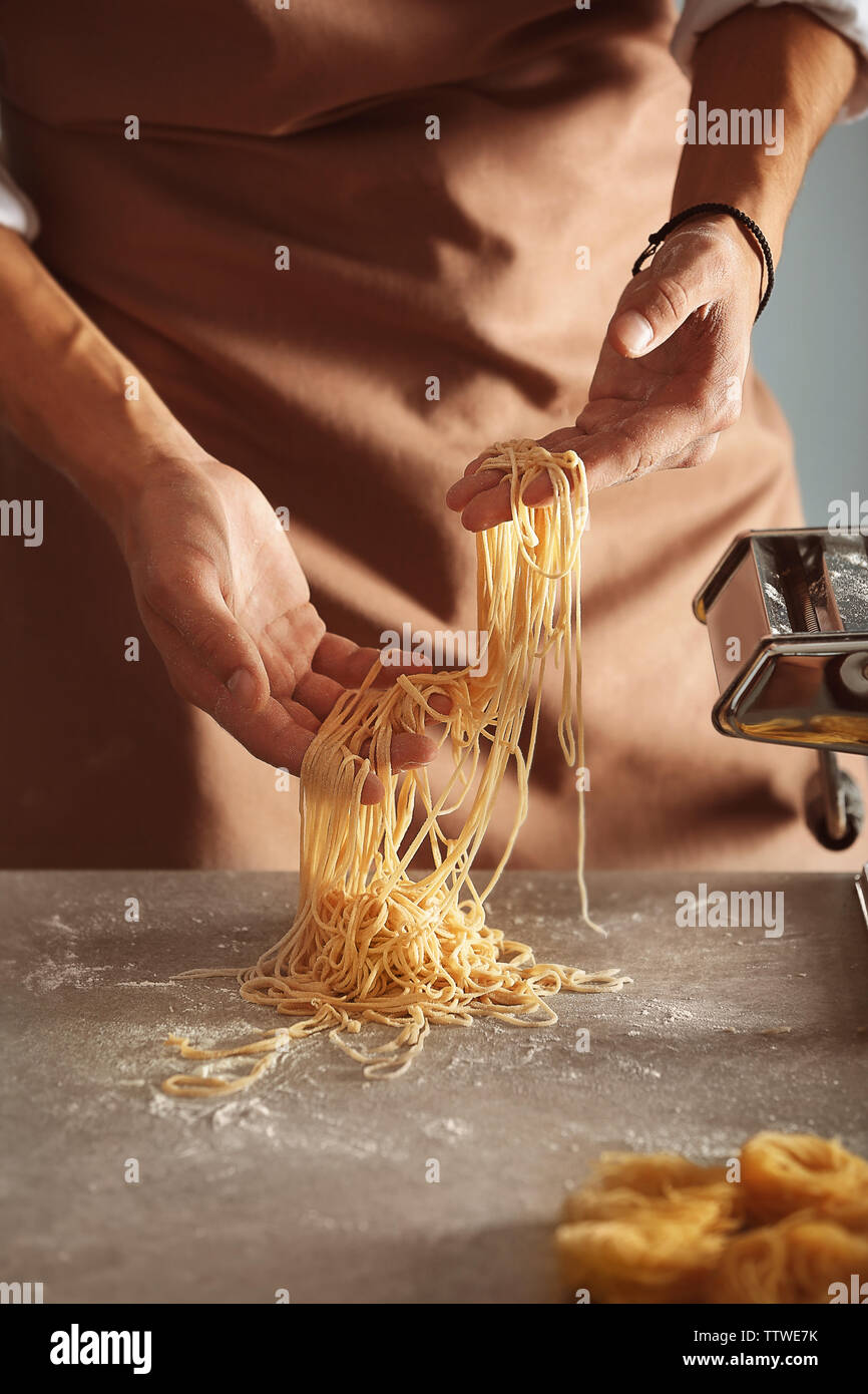 Close up man eating pasta hi-res stock photography and images - Alamy