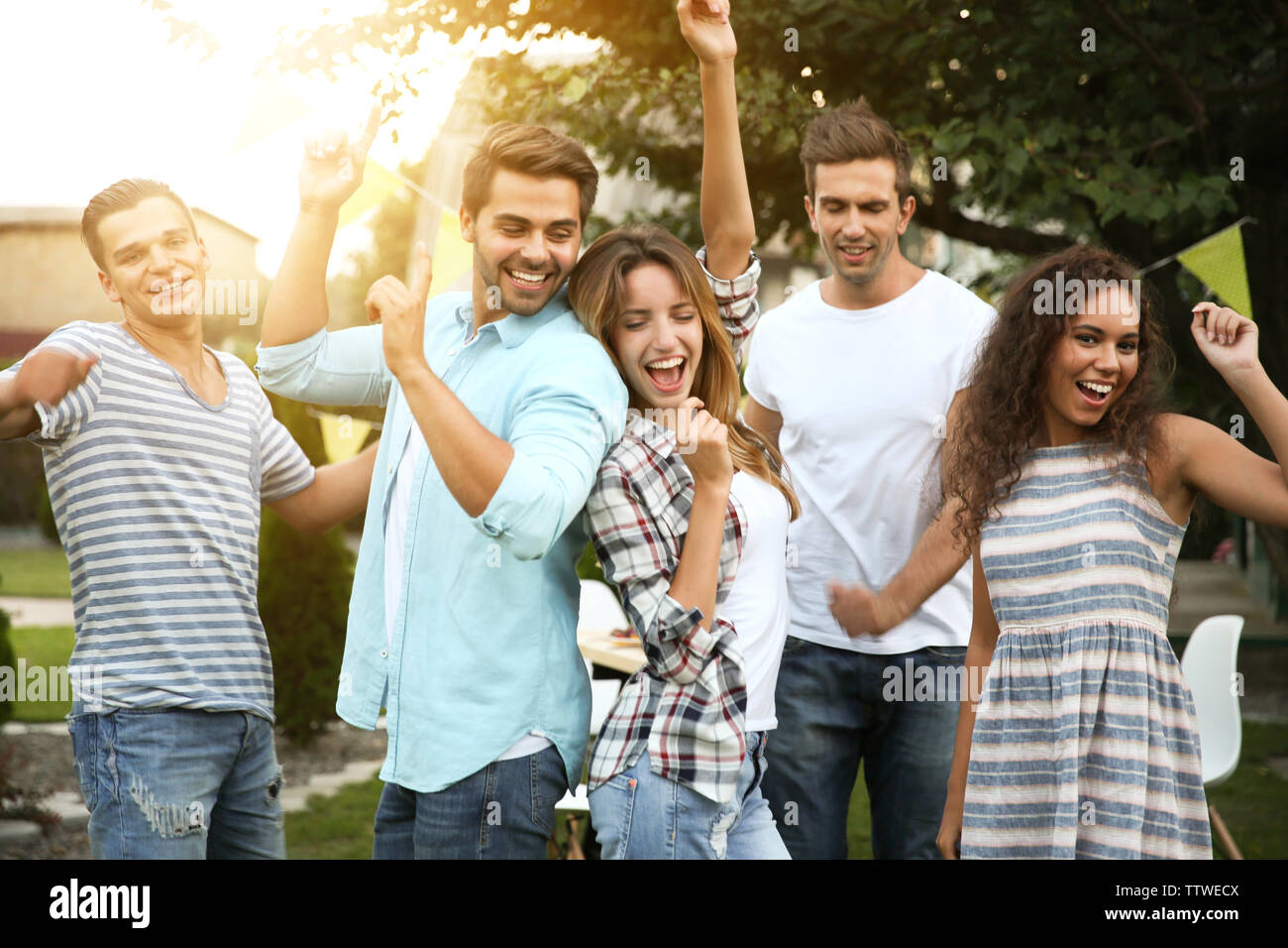 Woman dancing garden party hi-res stock photography and images - Alamy