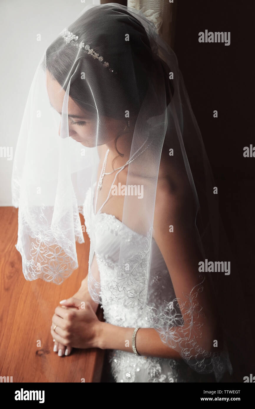 Beautiful bride waiting for wedding ceremony Stock Photo - Alamy