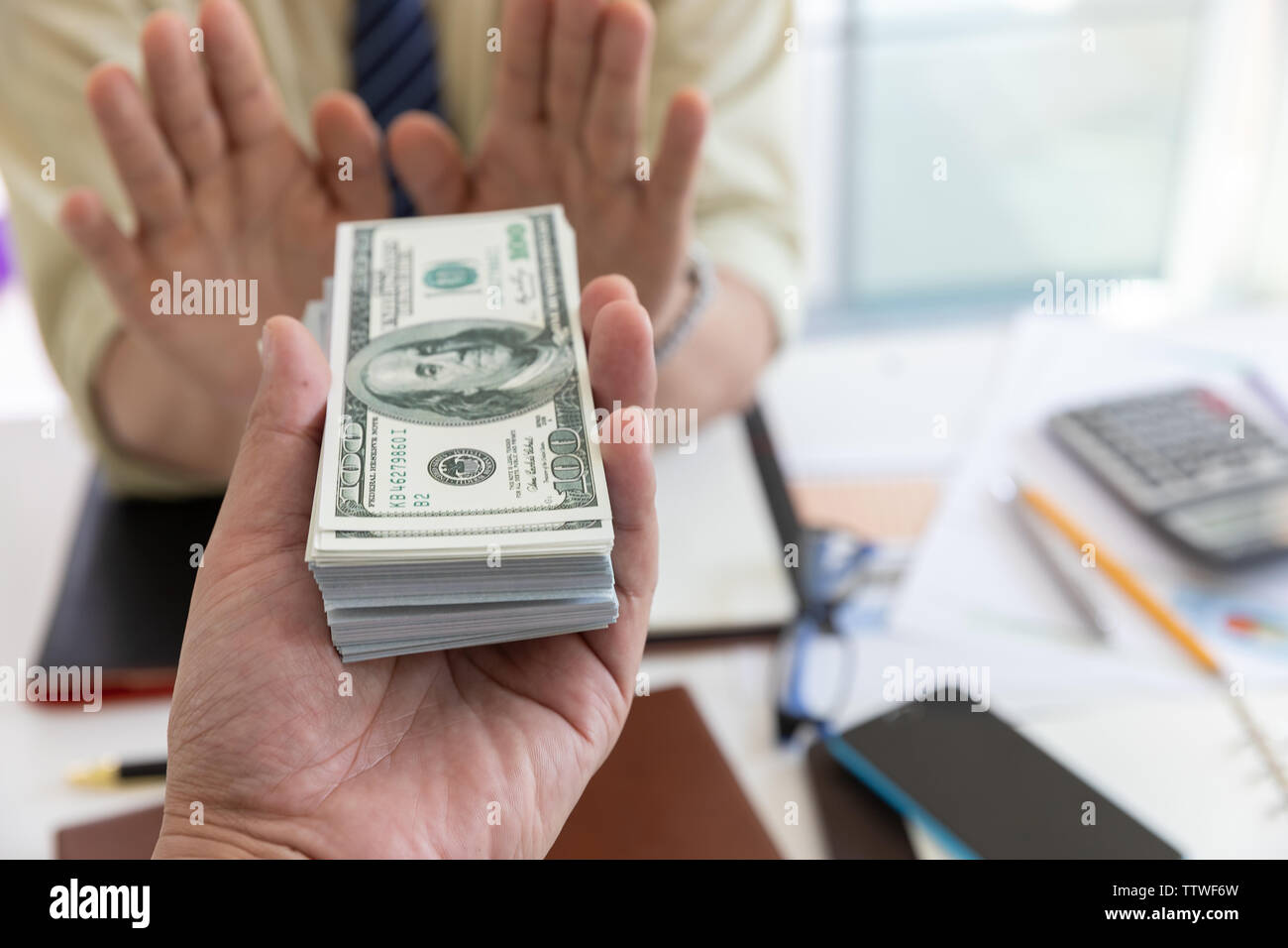Business And Finance Concept Hand Of A Businessman Refuse Money From