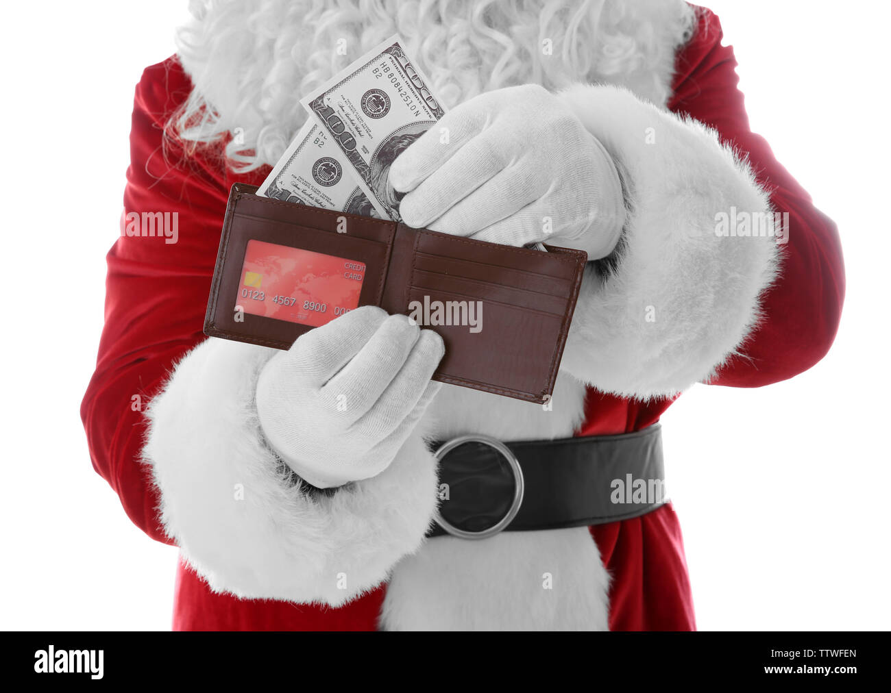 Santa Claus hands holding wallet with money and credit card on white ...