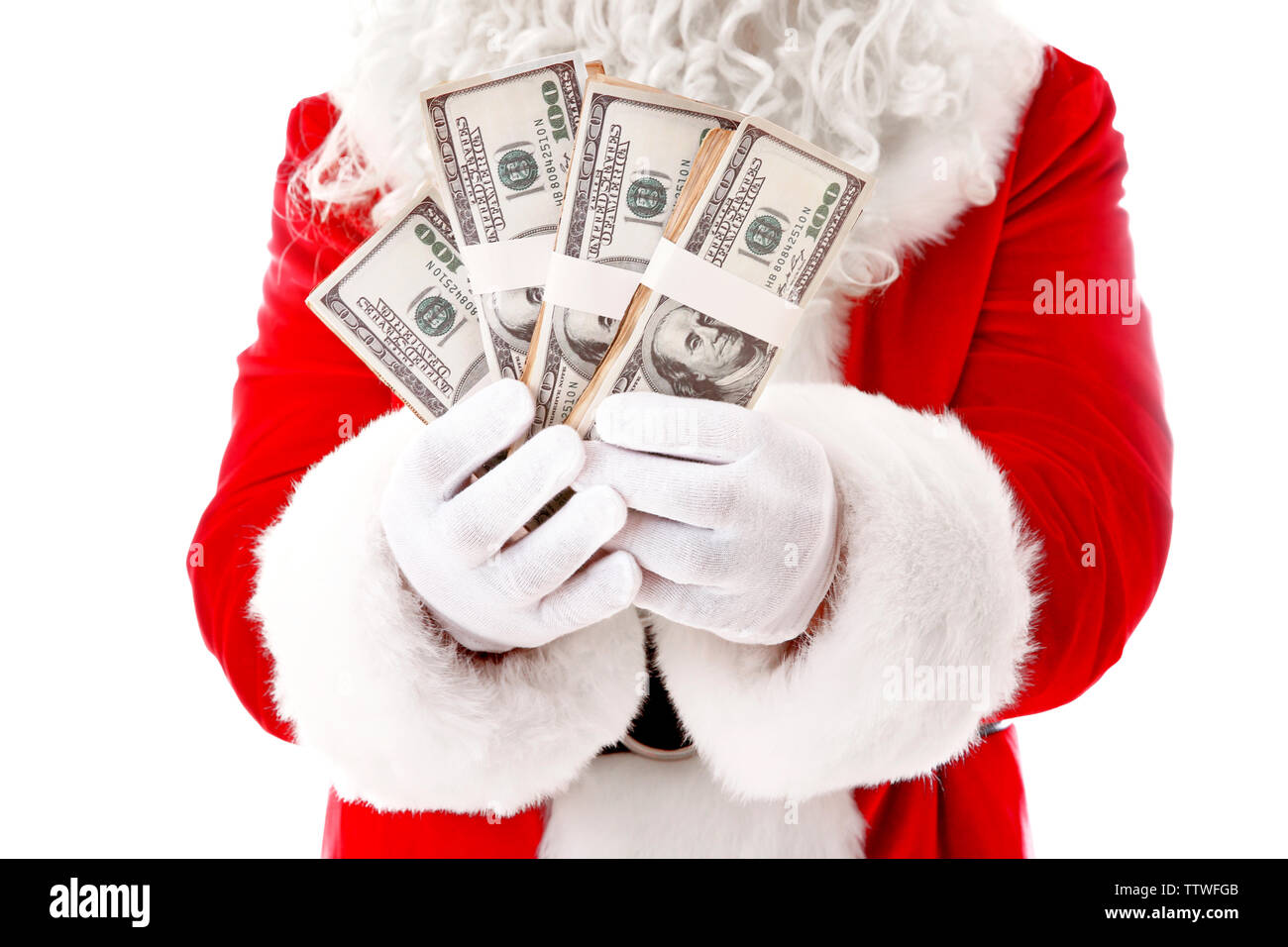 Santa Claus hands holding money on white background Stock Photo - Alamy