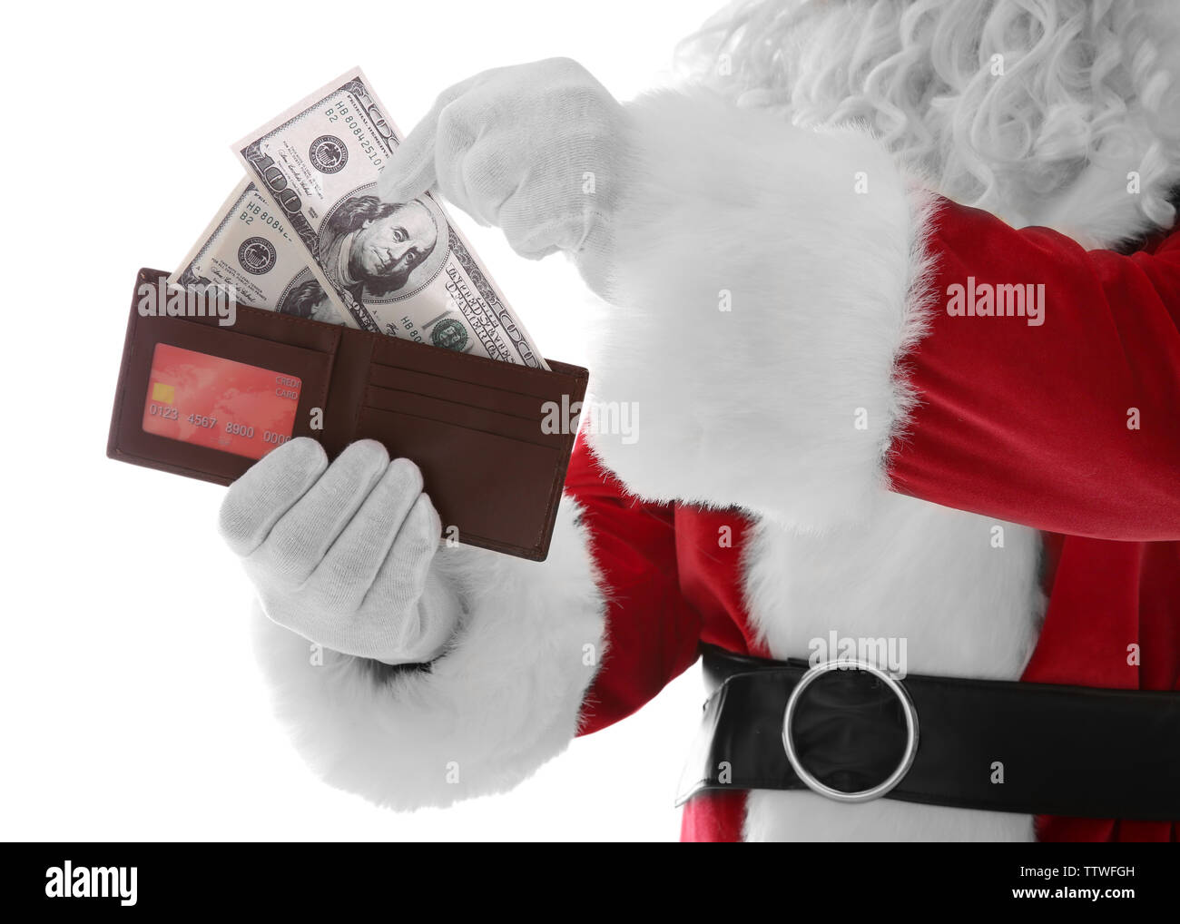 Santa Claus hands holding wallet with money and credit card on white ...